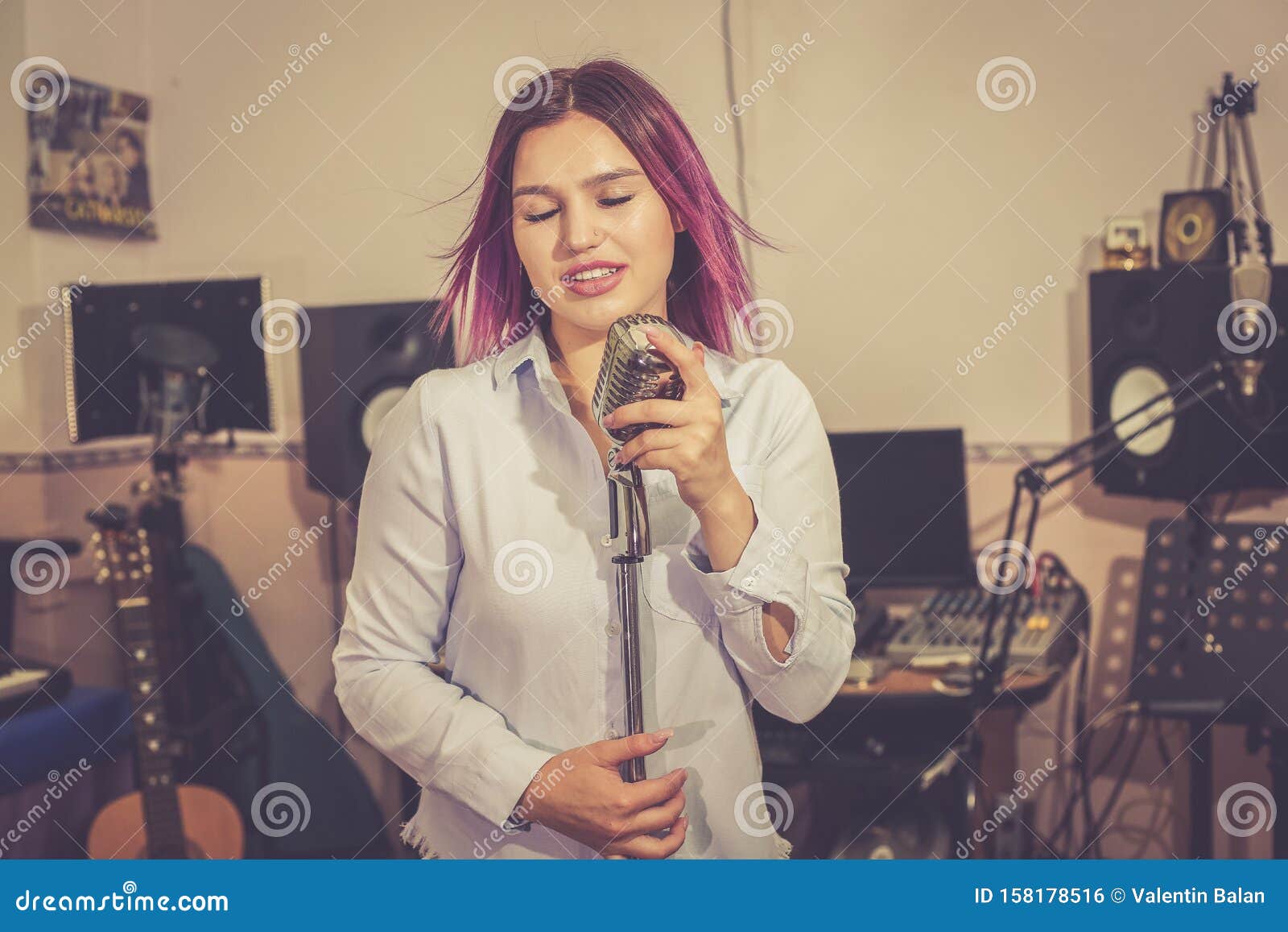 Pretty Girl Singing into Studio Microphone. Stock Photo - Image of ...