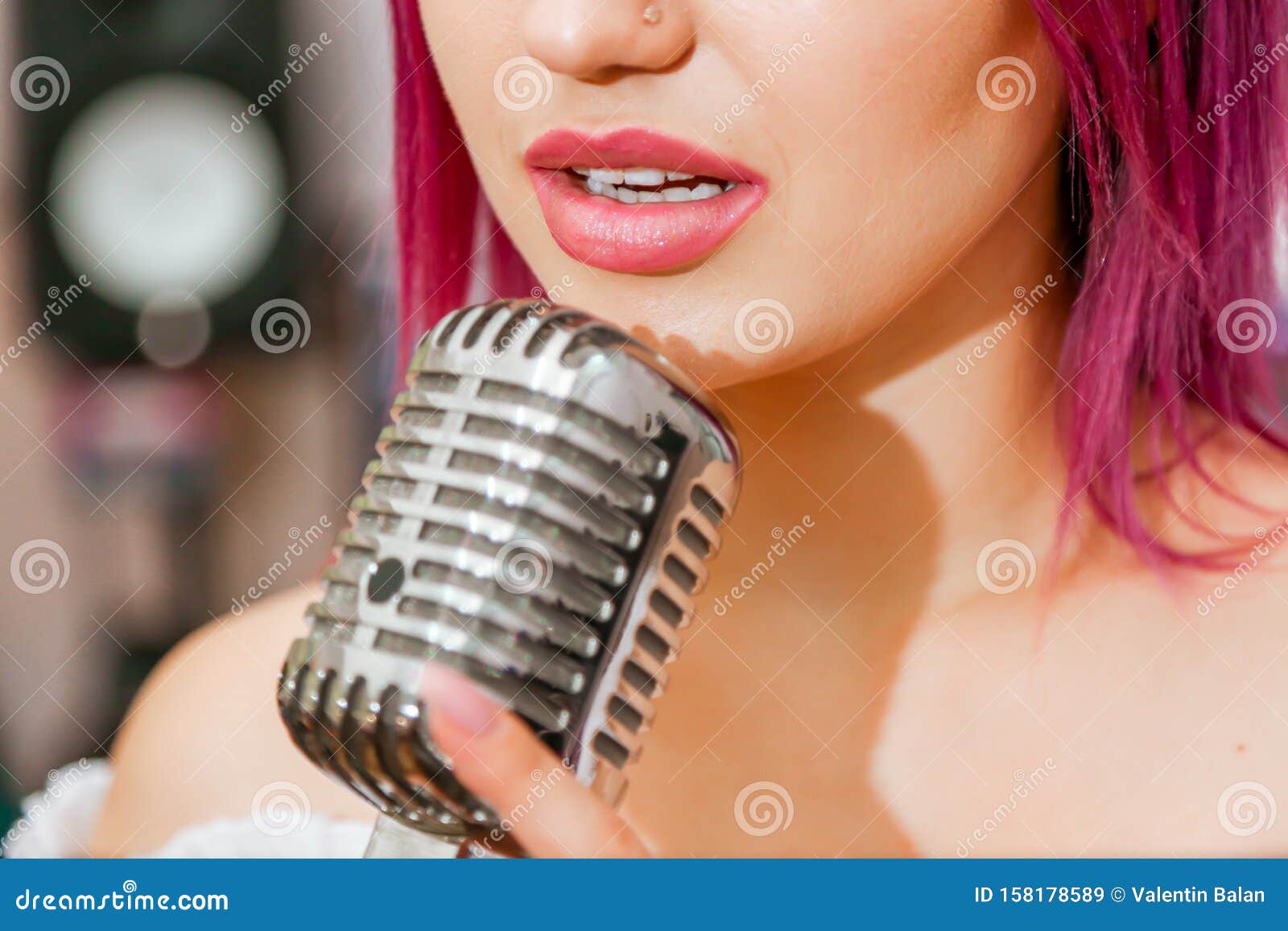 Pretty Girl Singing into Studio Microphone. Stock Image - Image of ...