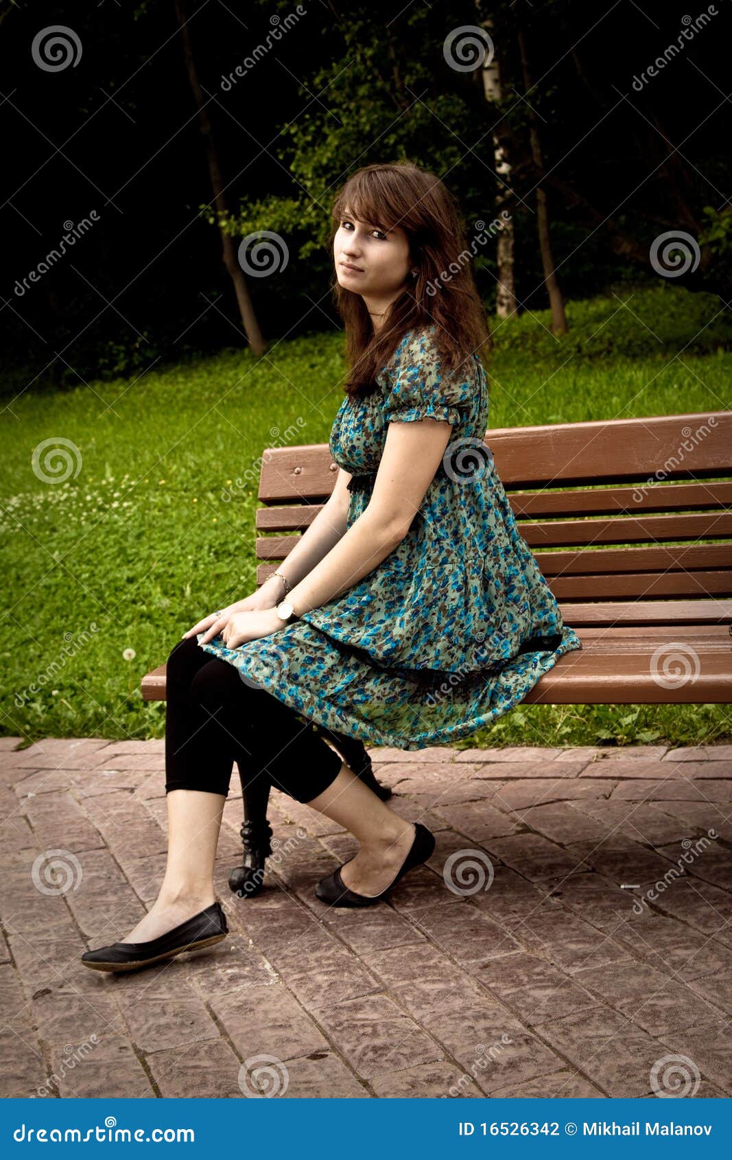 Pretty Girl Sitting on a Bench Stock Photo - Image of real, lane: 16526342