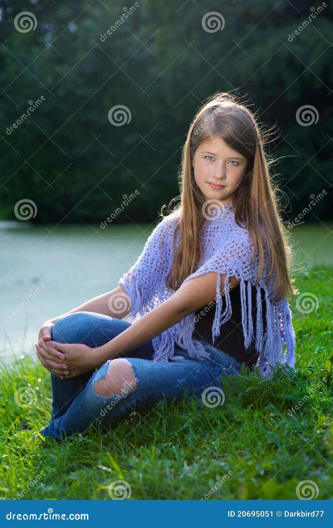 Pretty Girl Sitting on the Grass Stock Image - Image of hand, green ...