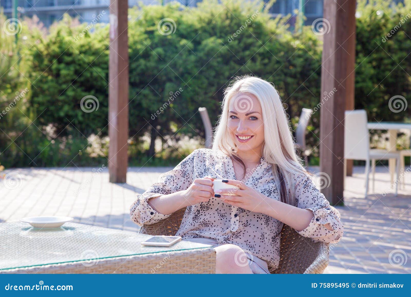 Pretty Girl Sitting at a Table in the Restaurant Stock Image - Image of ...