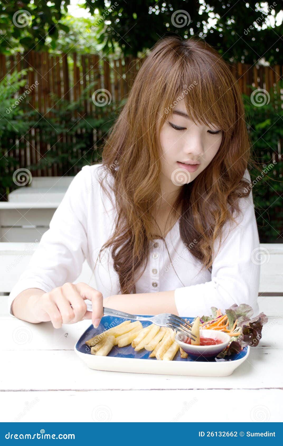 Pretty girl with snack stock photo. Image of female, teenage - 26132662