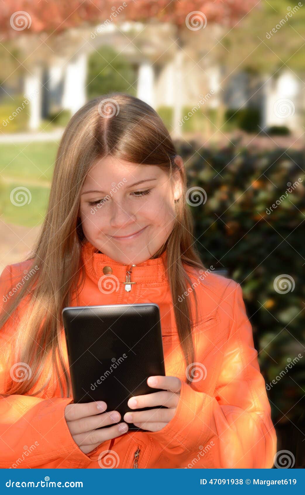 Pretty Girl Using Her Tablet Stock Photo - Image of exploring ...