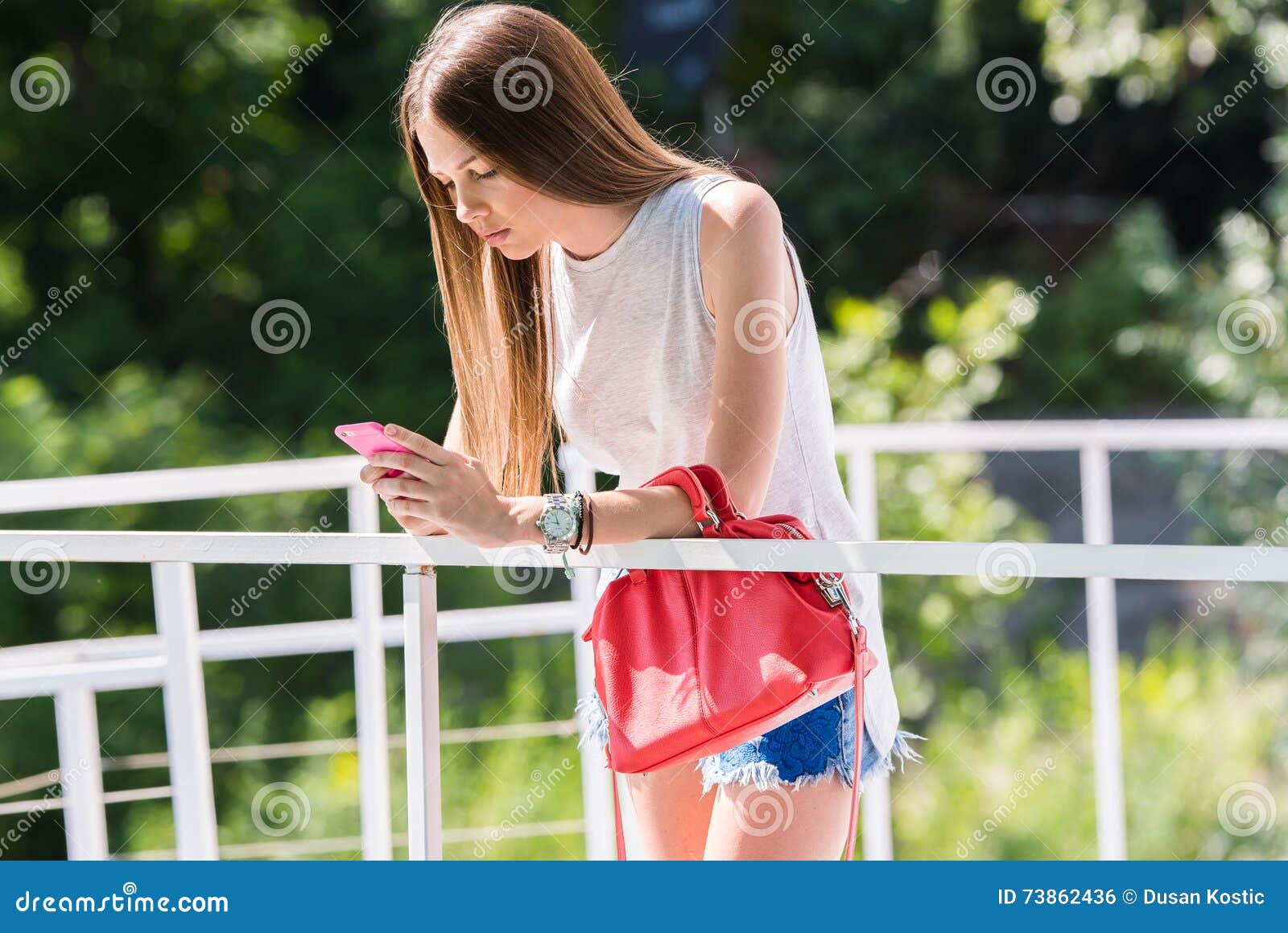 Pretty Girl Using Mobile Phone Stock Photo - Image of comfortable ...