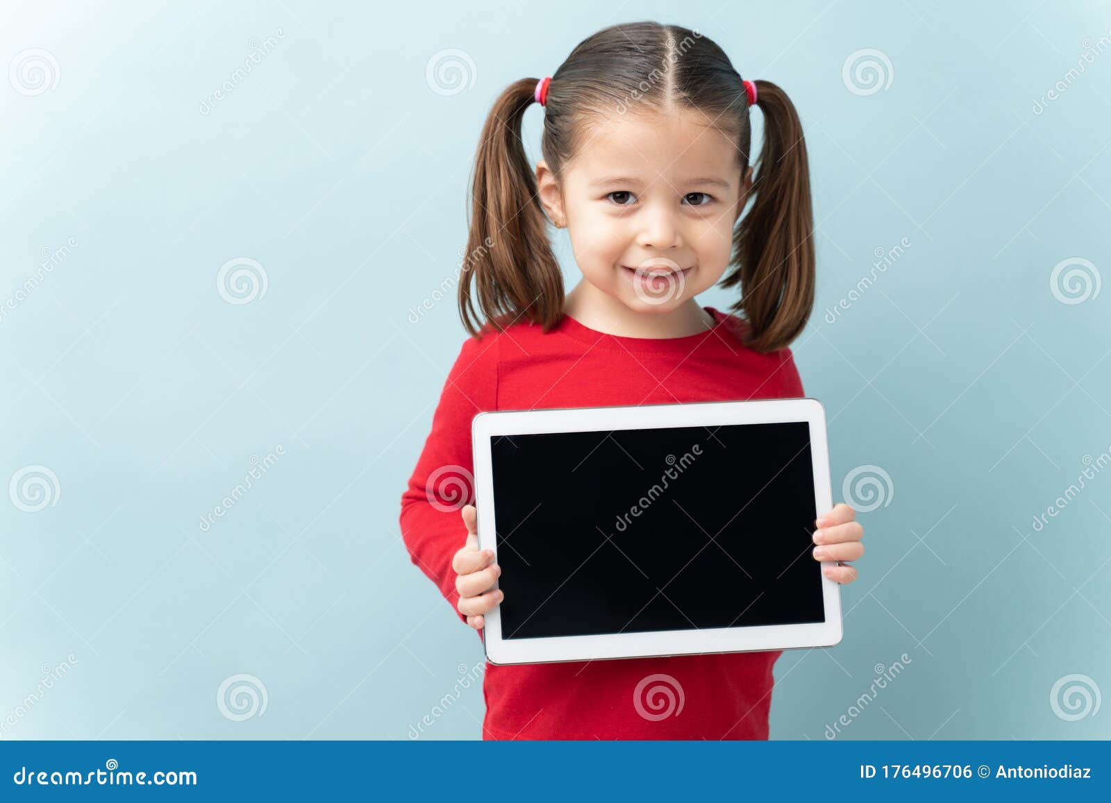 Pretty Girl Using Technology in a Studio Stock Photo - Image of website ...