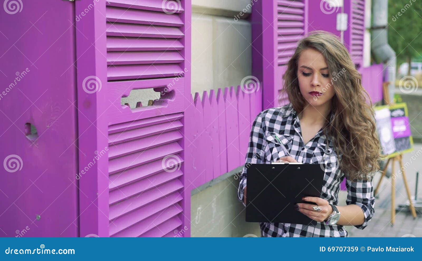 Pretty Girl Writing on a Notebook on a Background Stock Video - Video ...