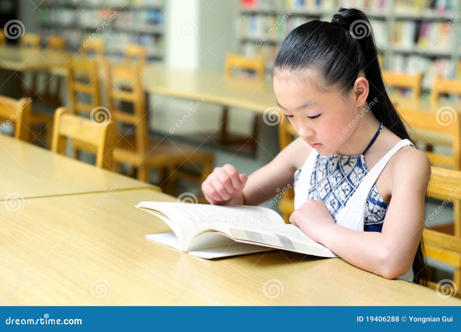 Pretty Girls Studying in the Library Stock Photo - Image of tables ...
