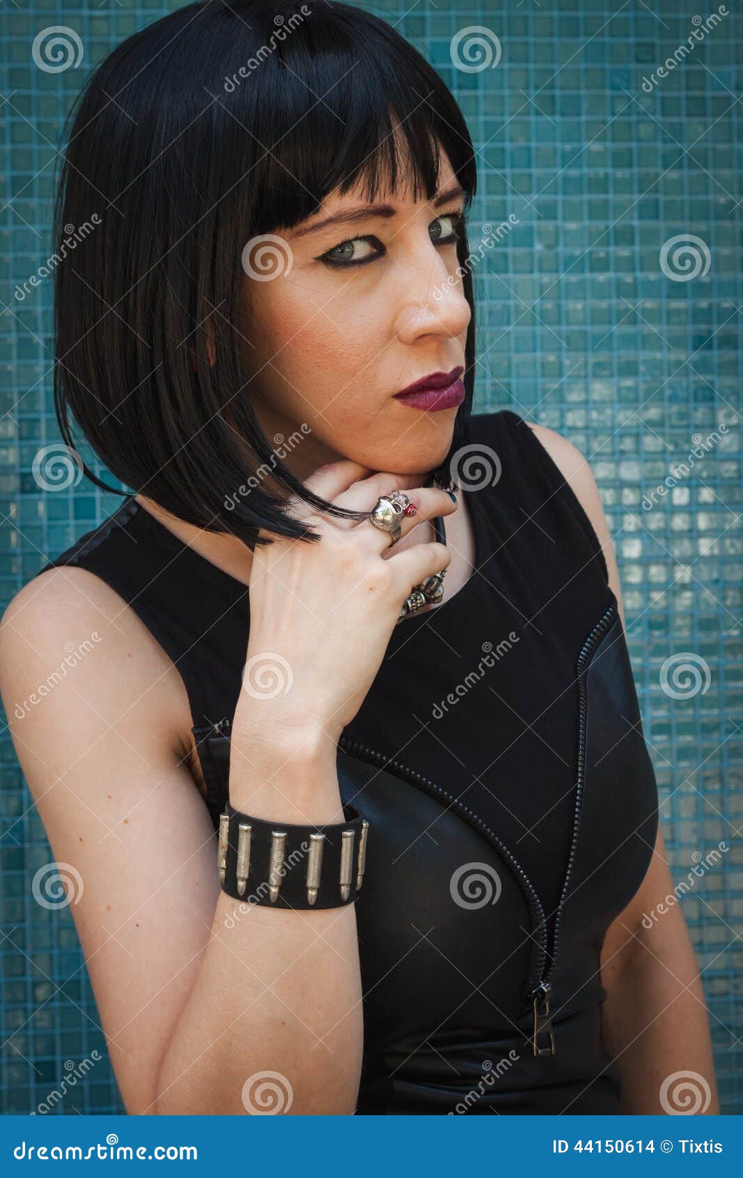 Pretty Goth Girl Posing Against A Blue Wall Royalty-Free Stock Image ...