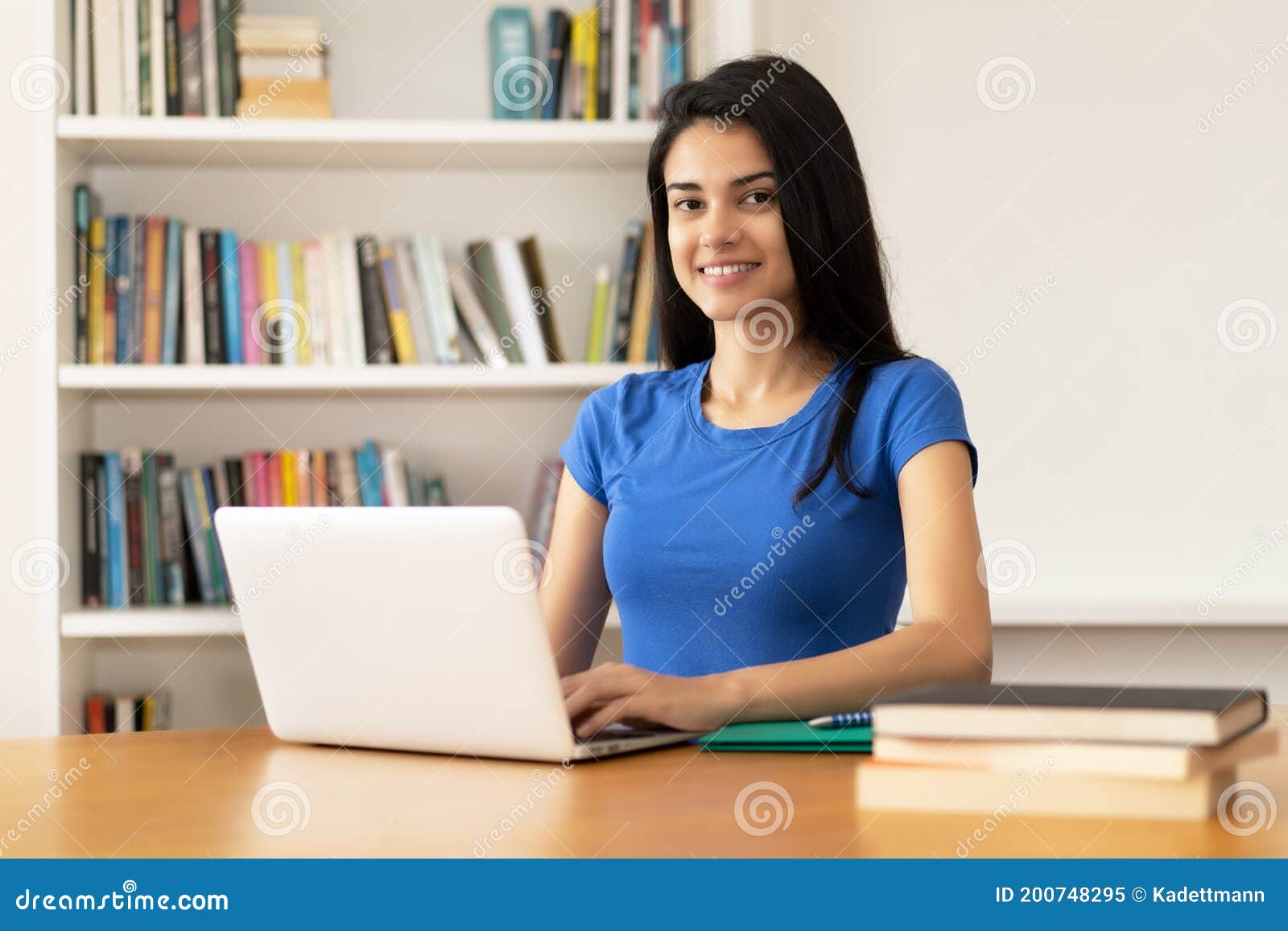 Pretty Hispanic Female Student Learning Online at Computer Stock Image ...
