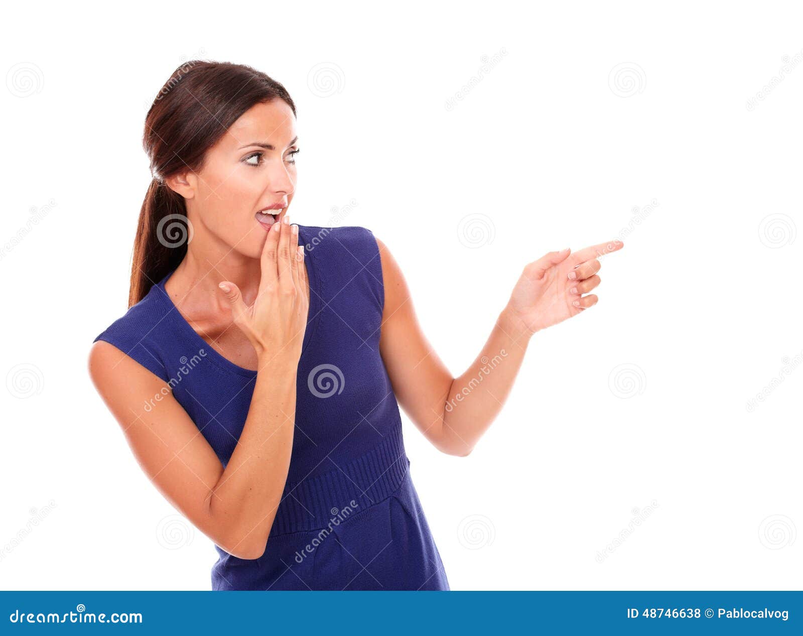 Pretty Hispanic Lady Pointing To Her Left Stock Photo - Image of ...