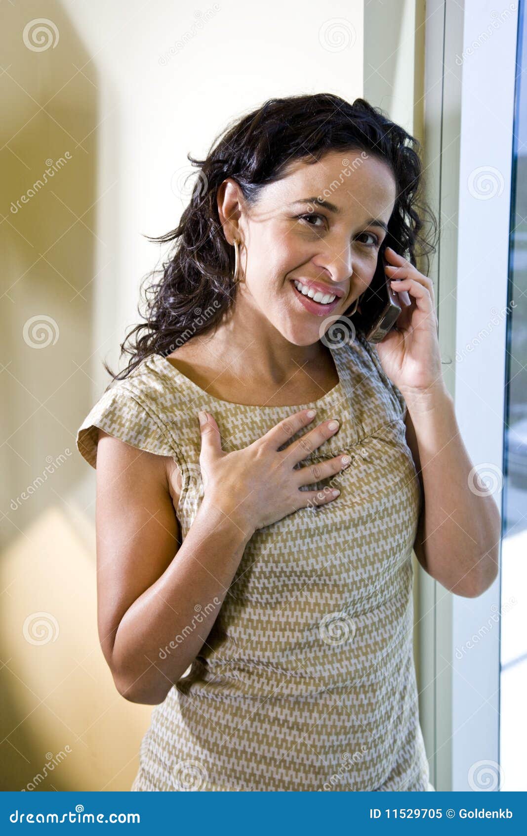 Pretty Hispanic Woman Talking on a Mobile Phone Stock Image - Image of ...