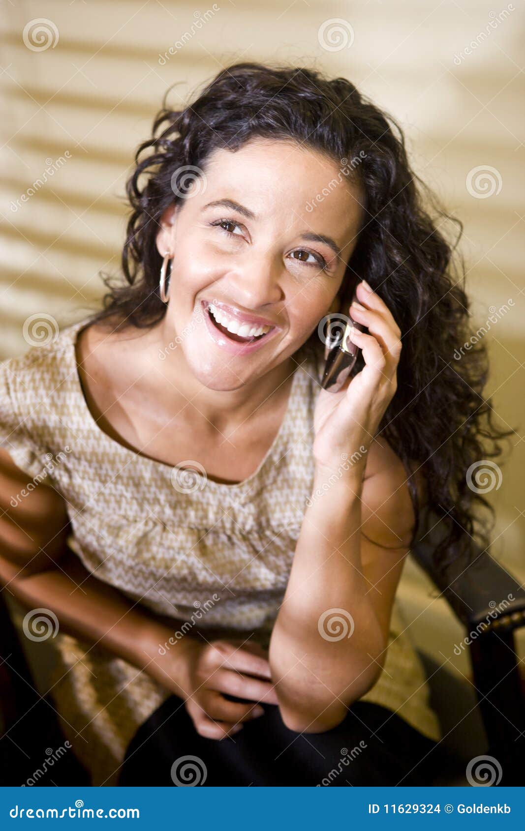 Pretty Hispanic Woman Talking on a Mobile Phone Stock Photo - Image of ...