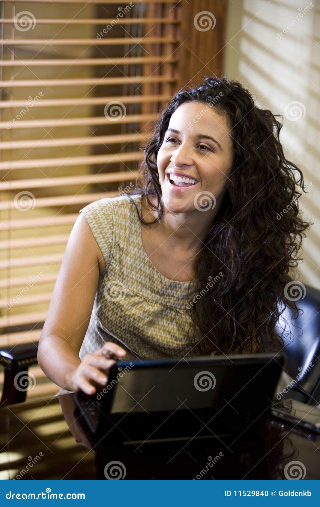 Pretty Hispanic Woman Using Laptop Computer Stock Photo - Image of ...