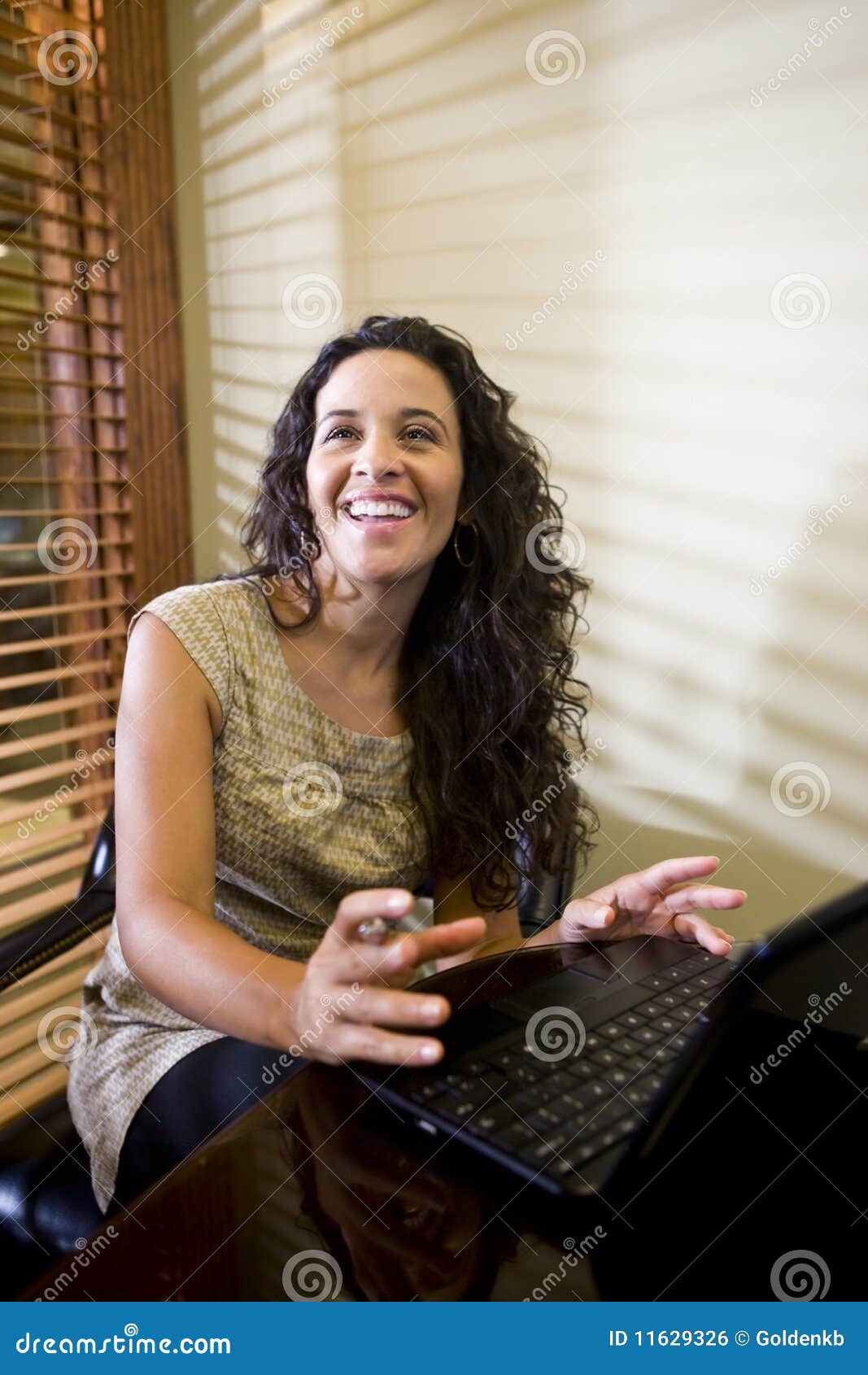 Pretty Hispanic Woman Using Laptop Computer Stock Photo - Image of ...