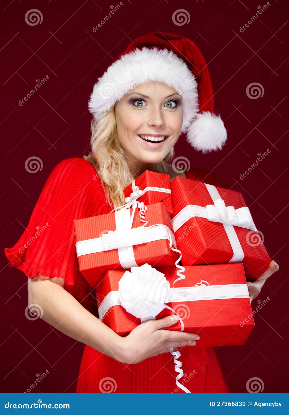 Pretty Lady in Christmas Cap Holds Presents Stock Image - Image of gown ...