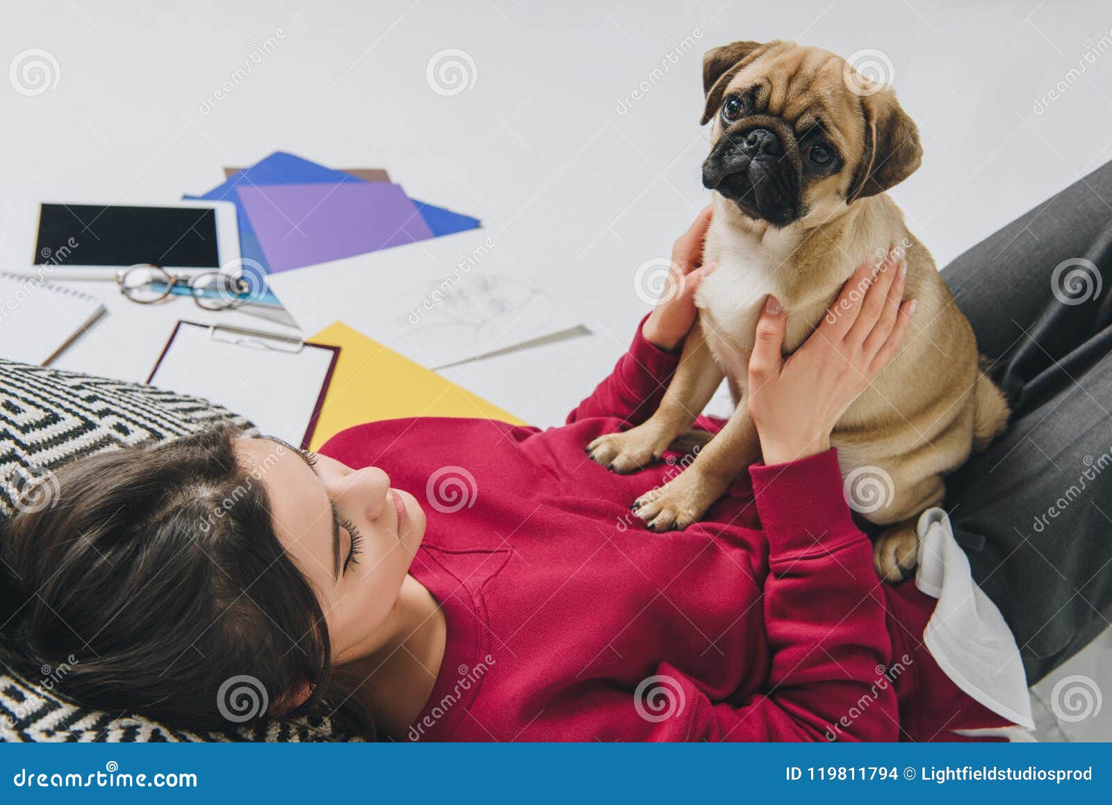 Pretty Lady Cuddling Pug on Floor Stock Photo - Image of fashionable ...