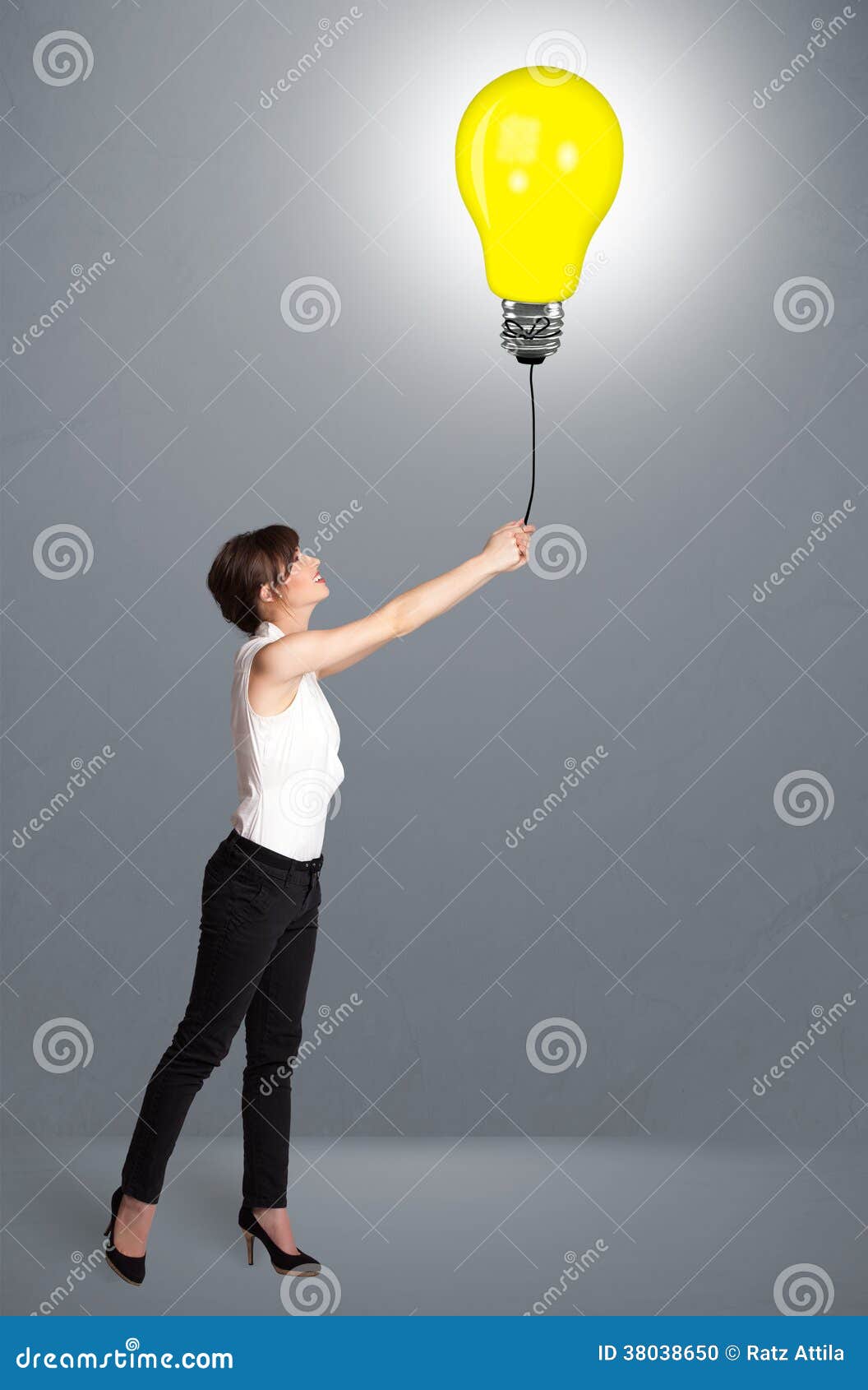 Pretty Lady Holding a Light Bulb Balloon Stock Photo - Image of holding ...