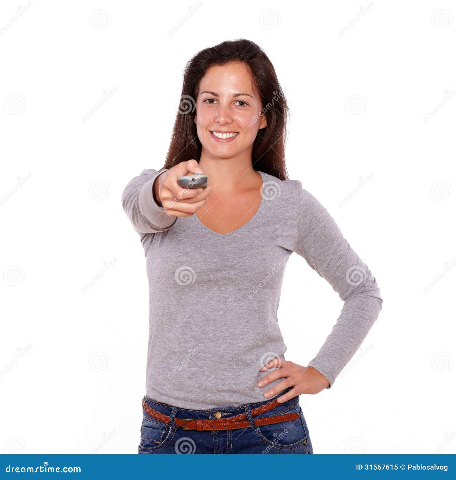 Pretty Lady Pointing Remote Control while Standing Stock Image - Image ...