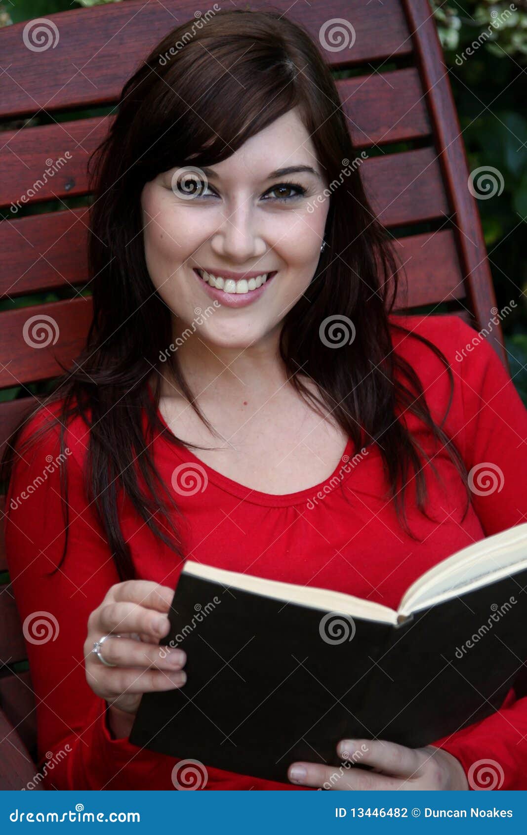Pretty Lady Reading Book stock photo. Image of chair - 13446482