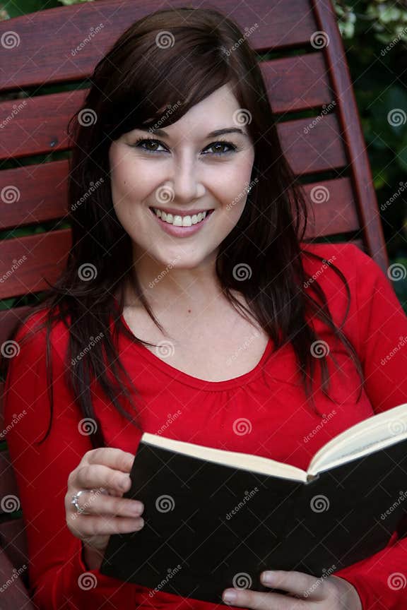 Pretty Lady Reading Book stock photo. Image of chair - 13446482