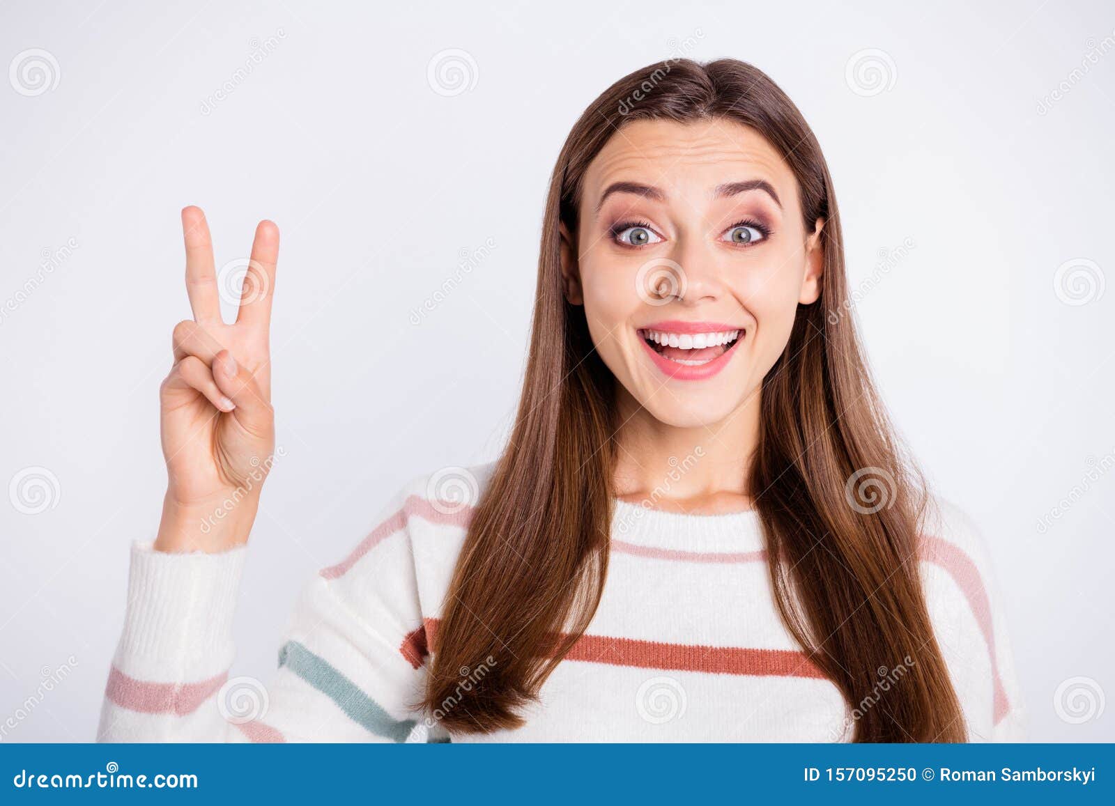 Pretty Lady Showing V Sign Symbol Wear Striped Pullover Isolated White