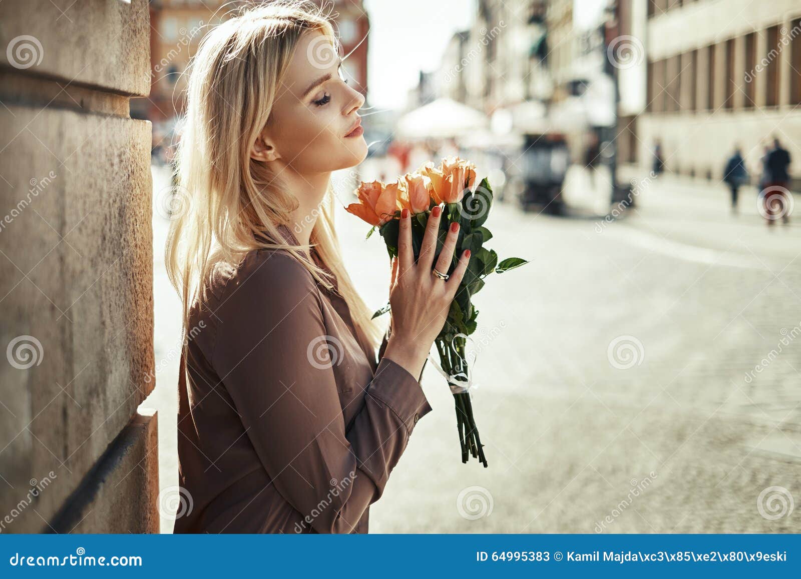 Pretty Lady Smelling Fragrant Roses Stock Image - Image of city, makeup ...