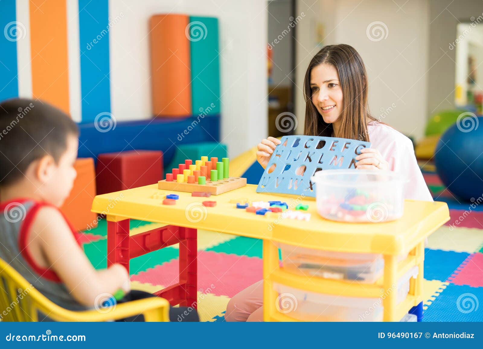 Pretty Language Therapist at Work Stock Image - Image of playing, good ...