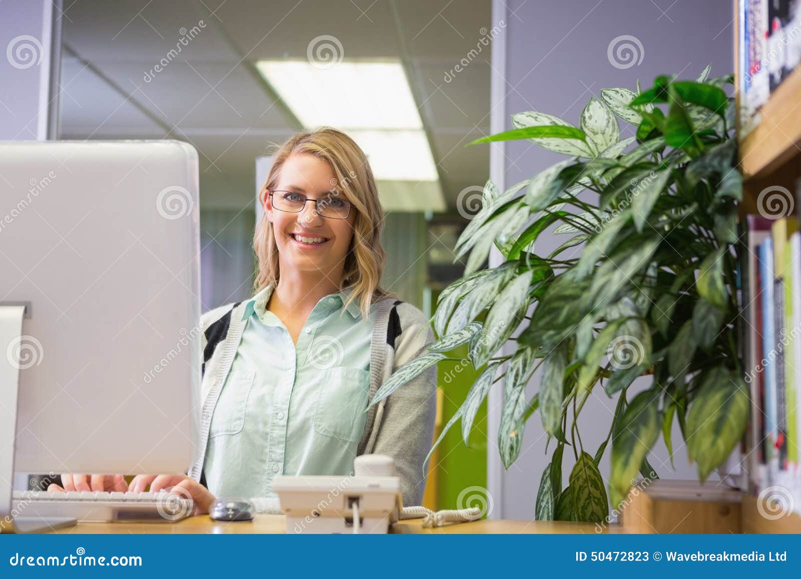 Pretty Librarian Smiling at Camera Stock Image - Image of indoors ...
