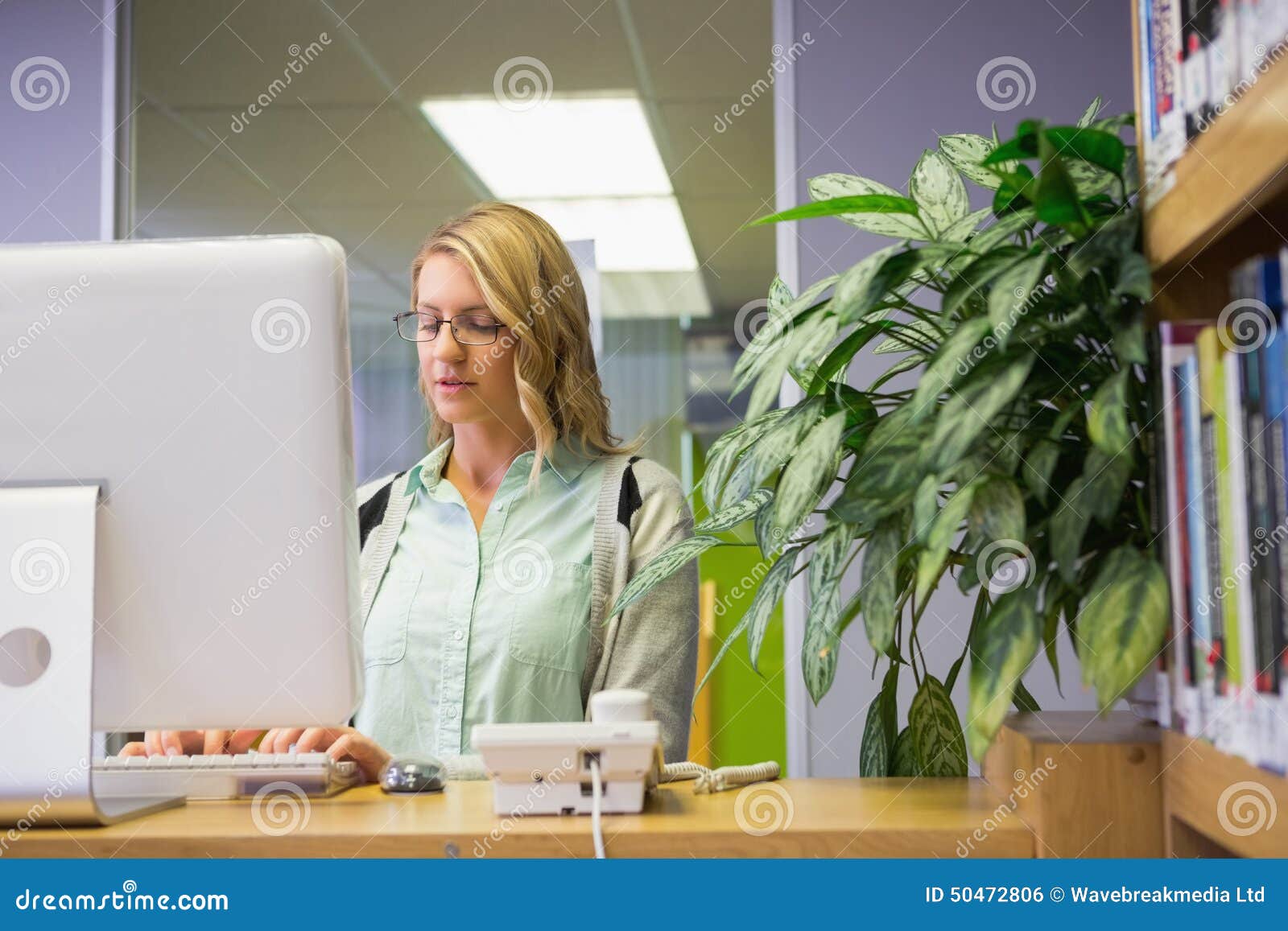 Pretty Librarian Working In The Library Stock Photography ...