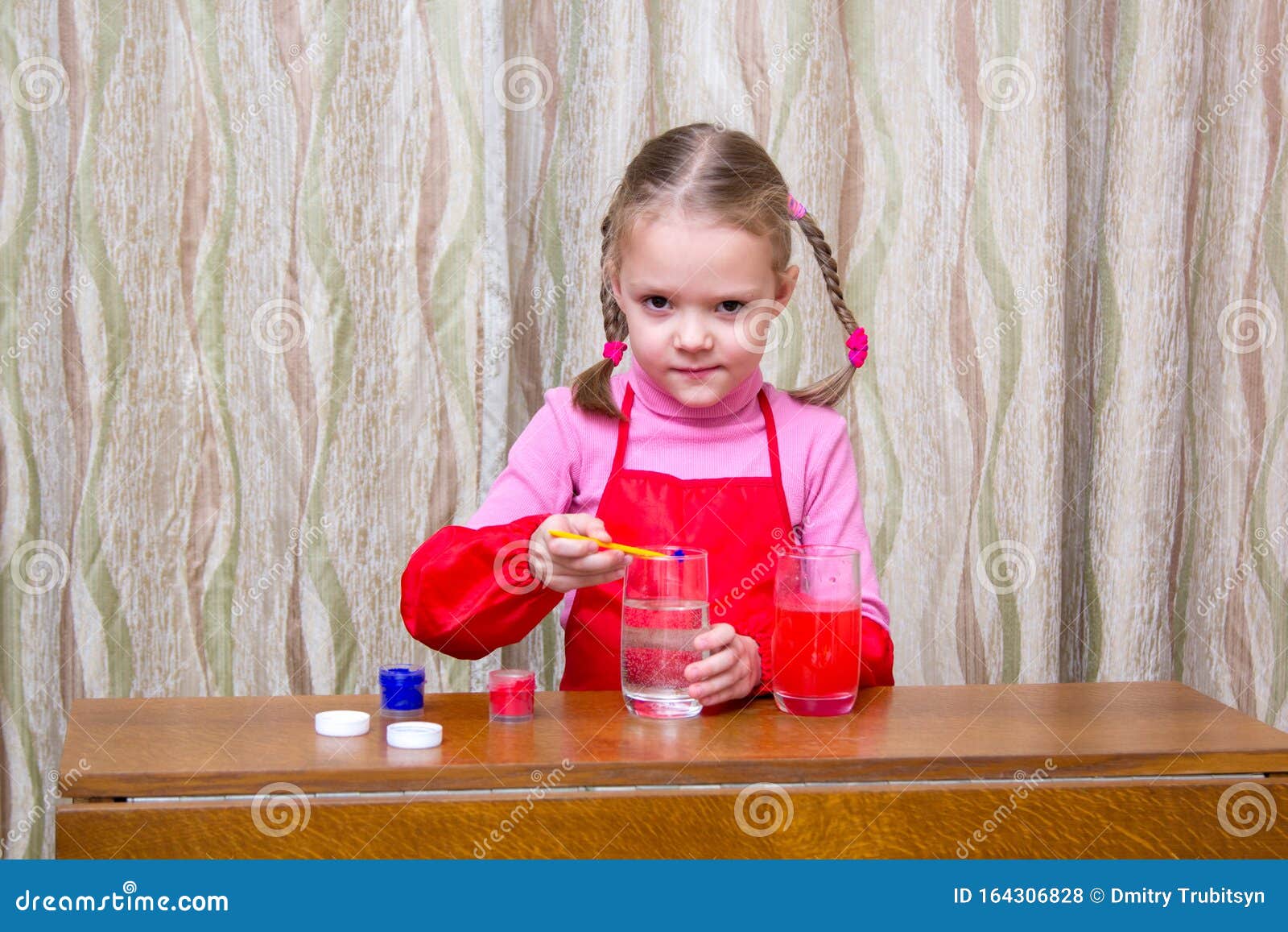 Pretty Little Girl Doing Physical Water Experiments at Home Stock Photo ...