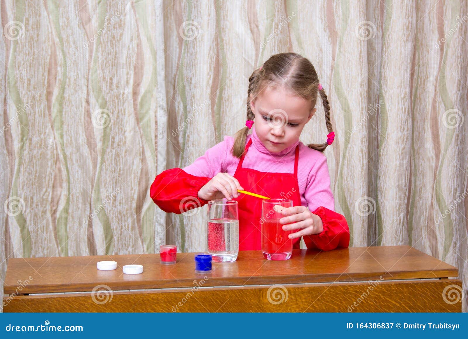 Pretty Little Girl Doing Physical Water Experiments at Home Stock Image ...