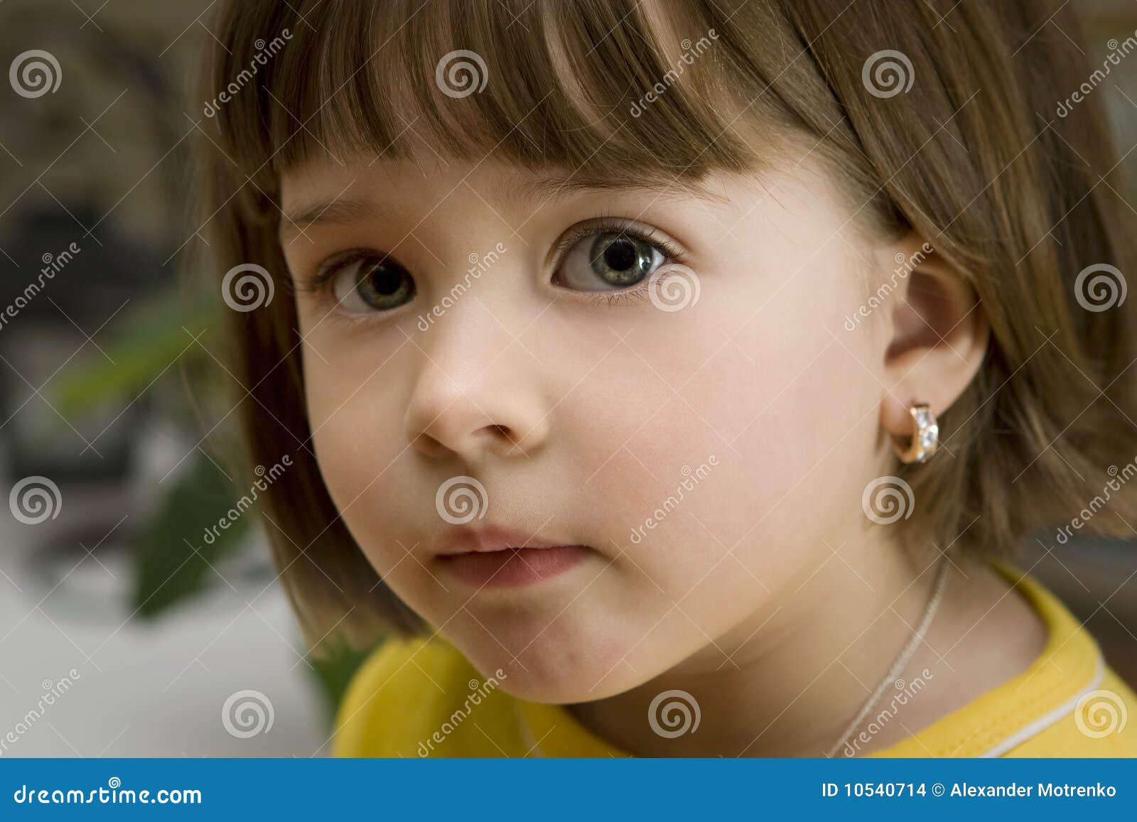 Pretty Little Girl with an Earing Stock Photo - Image of kids, gold ...