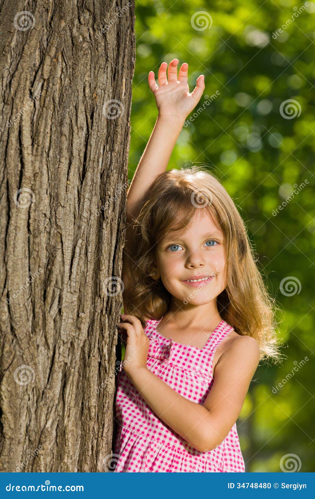 Pretty Little Girl Near a Tree Stock Photo - Image of happy, enjoy ...
