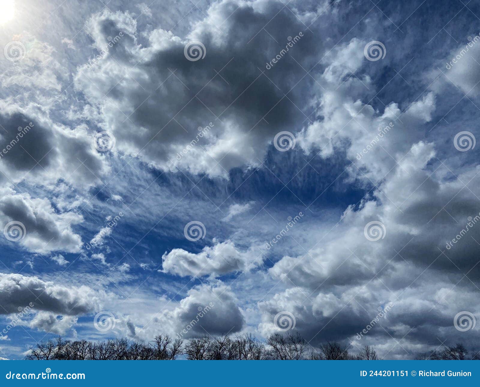 Pretty March Cloud Formations on a Windy Day Stock Image - Image of ...