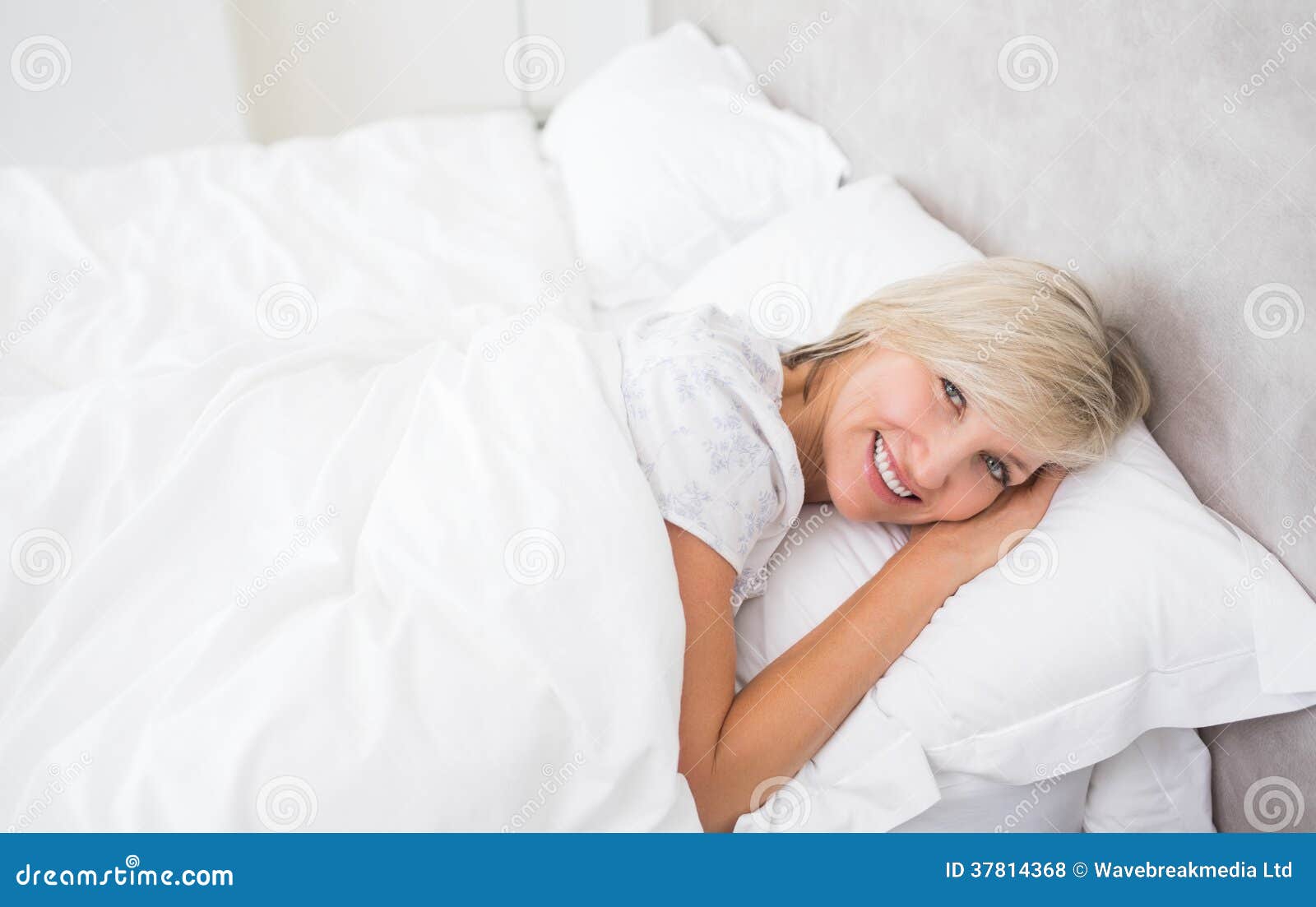 Pretty Mature Woman Resting in Bed Stock Photo - Image of person ...