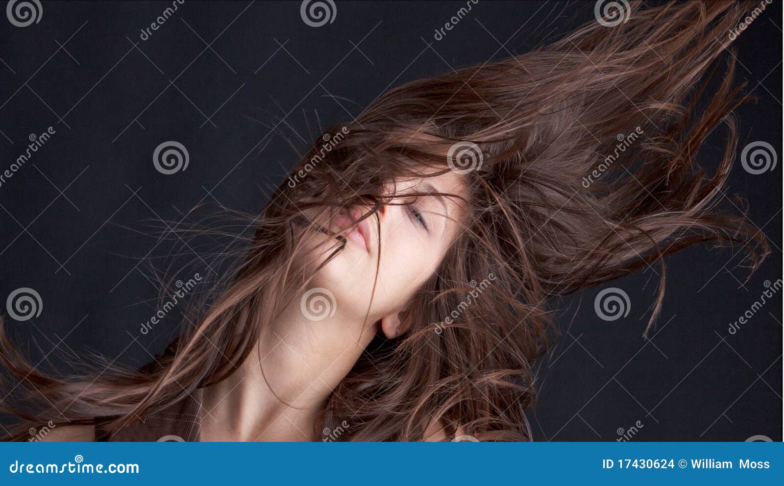 Pretty Model Flinging Hair Wildly Stock Photo - Image of luster, shine ...