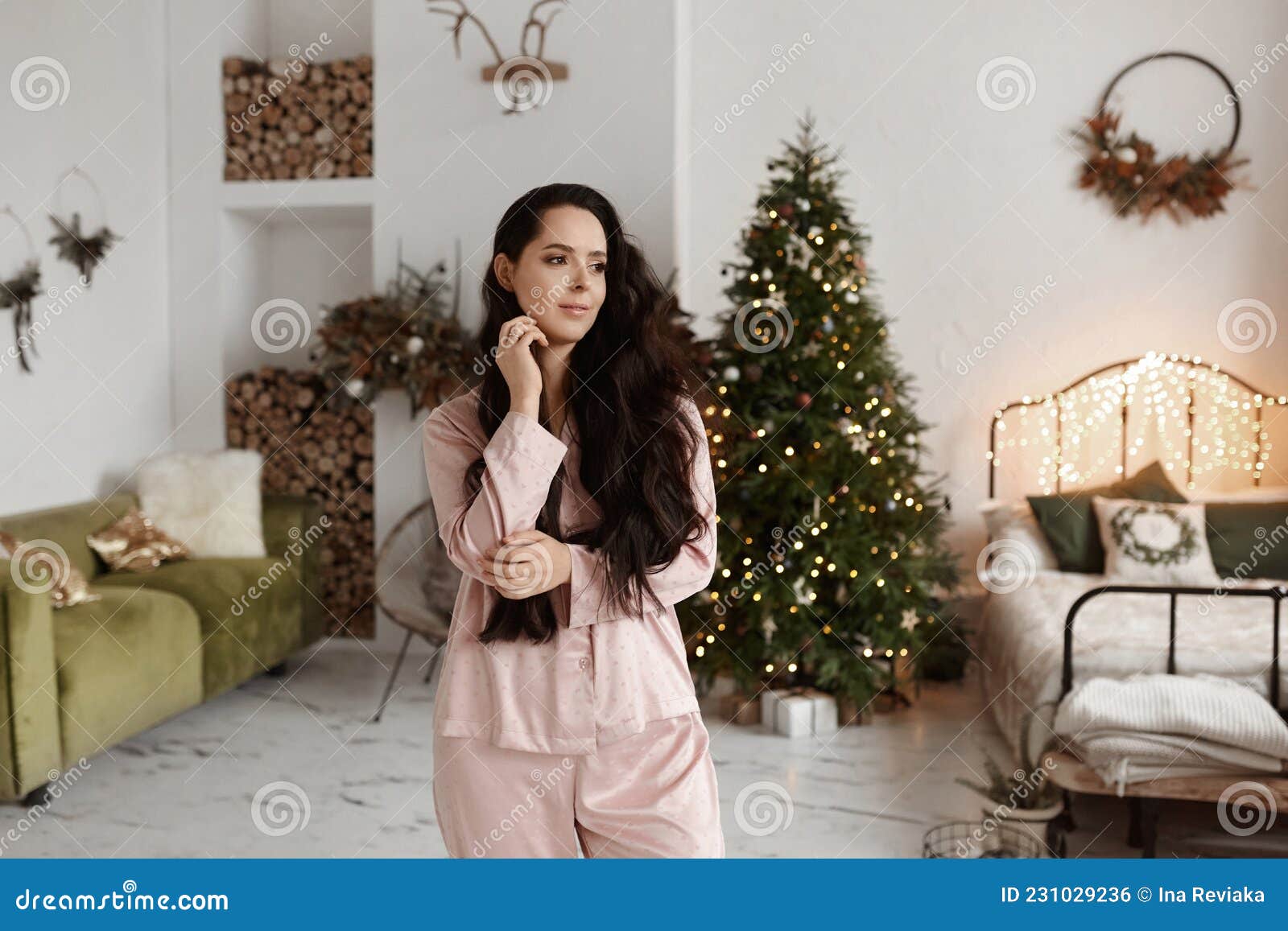 Pretty Model Girl With Dark Hair Wearing Modish Sleepwear Posing In