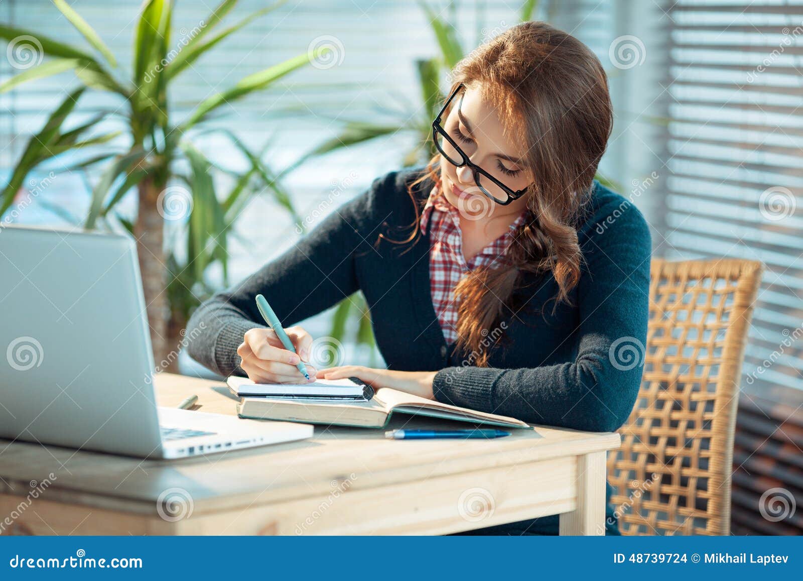 Pretty nerd girl studies stock photo. Image of clever - 48739724