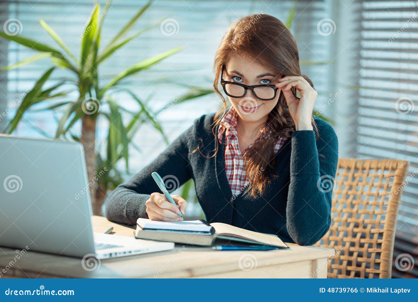 Pretty nerd girl studies stock photo. Image of beauty - 48739766