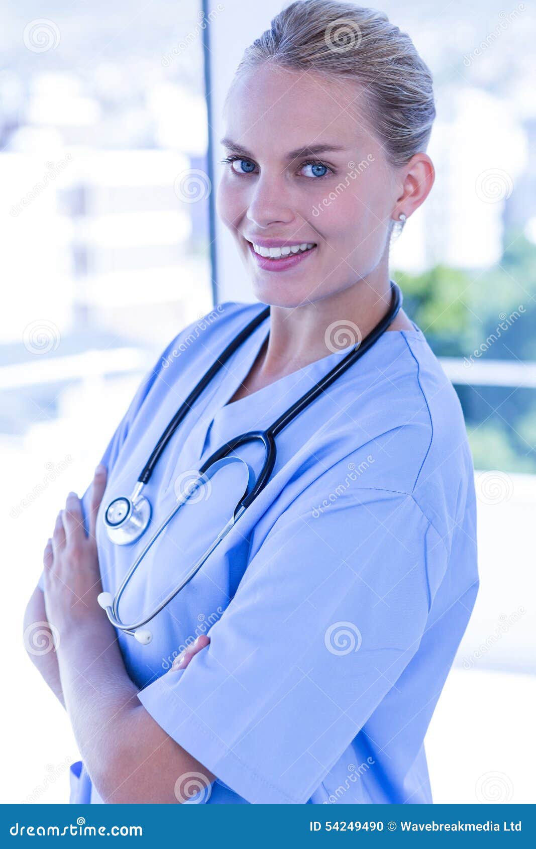 Pretty Nurse Smiling at the Camera Stock Photo - Image of uniform ...
