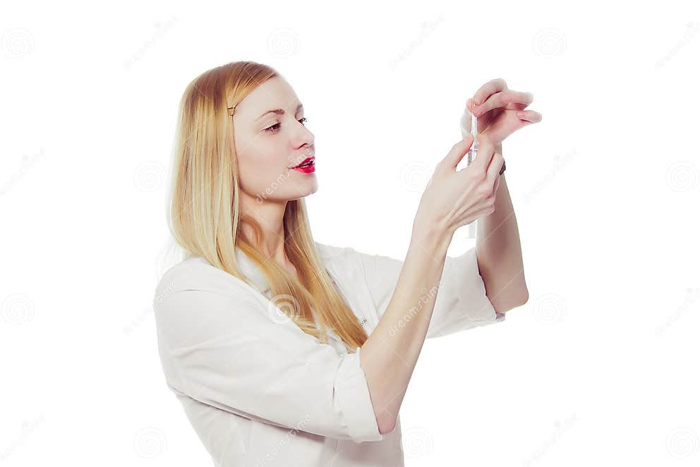 Pretty nurse with syringe stock photo. Image of medic - 20668788