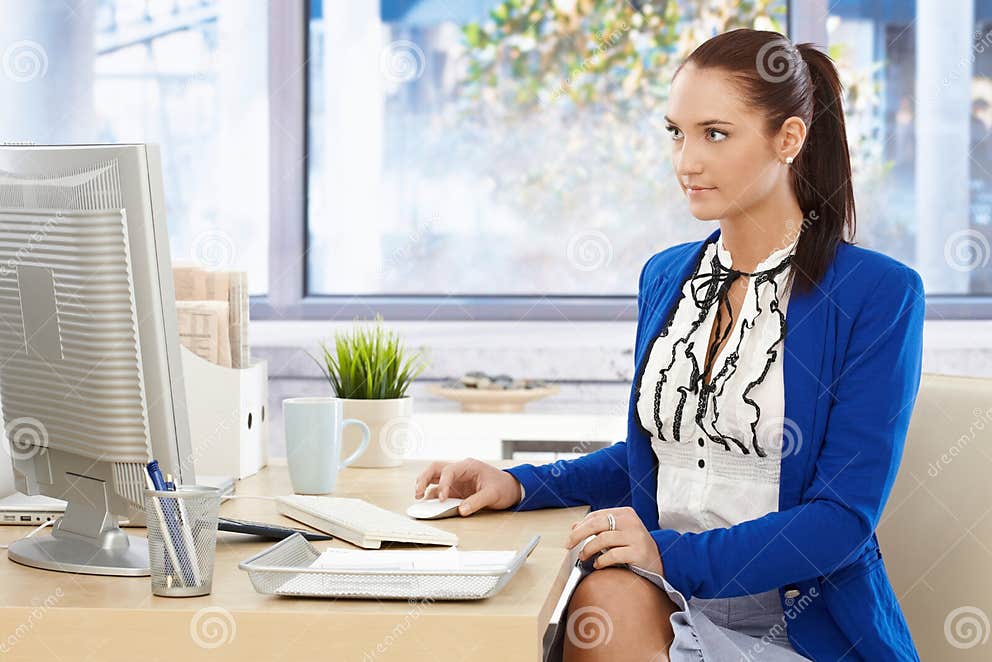 Pretty Office Worker at Desk Stock Photo - Image of cardigan, elegance ...