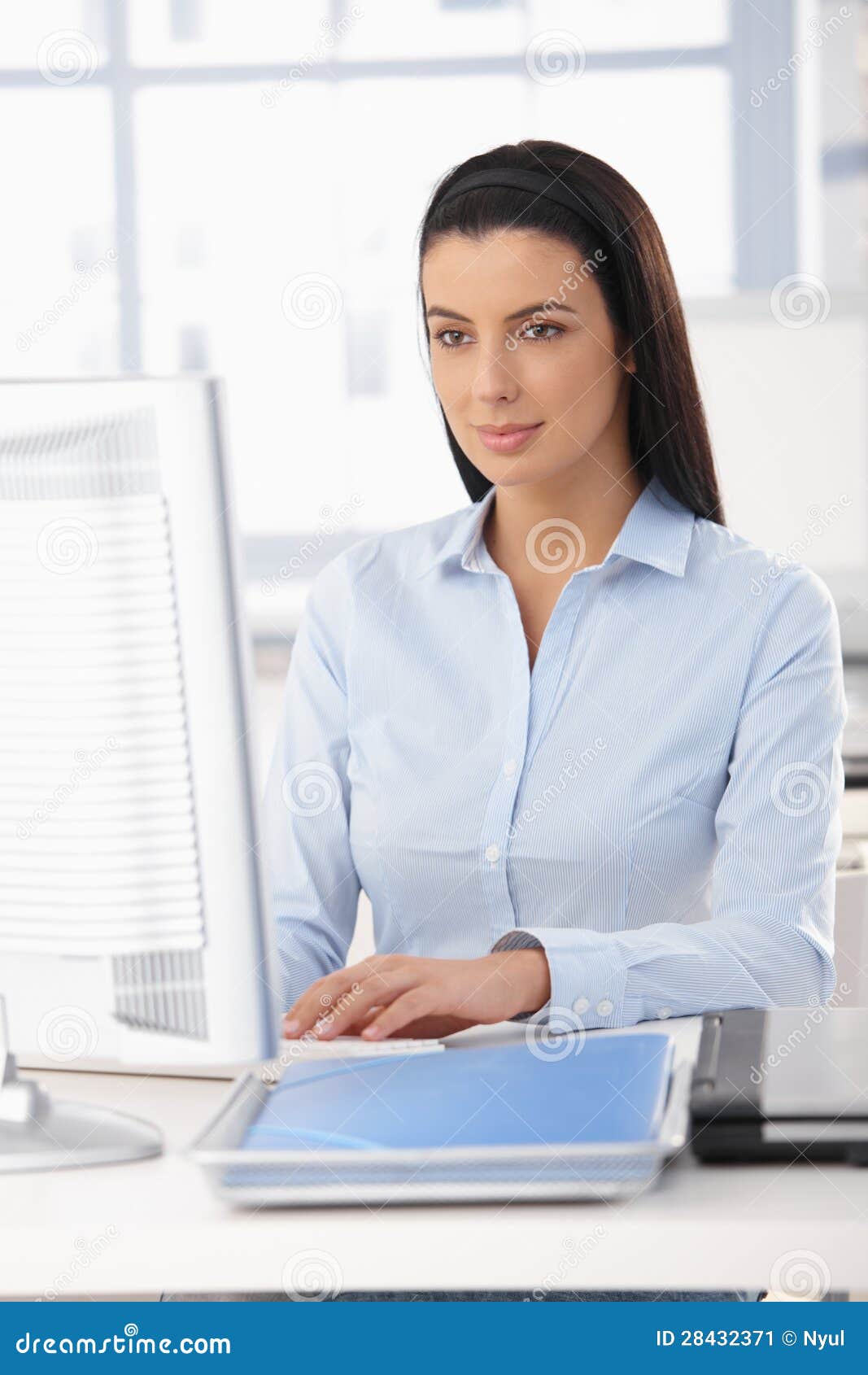 Pretty Office Worker At Desk Stock Image - Image: 28432371