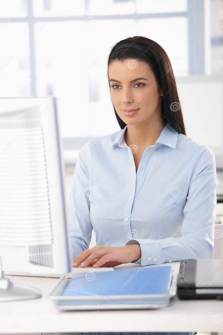 Pretty Office Worker at Desk Stock Image - Image of good, american ...