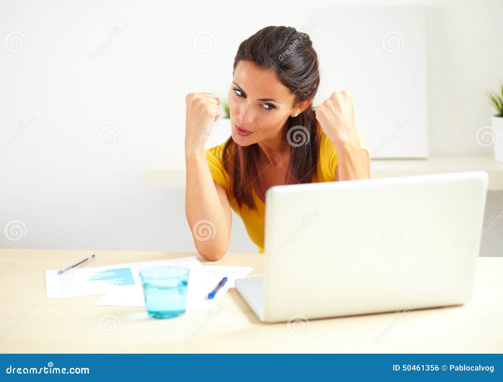 Pretty Receptionist Smiling and Looking Happy Stock Photo - Image of ...