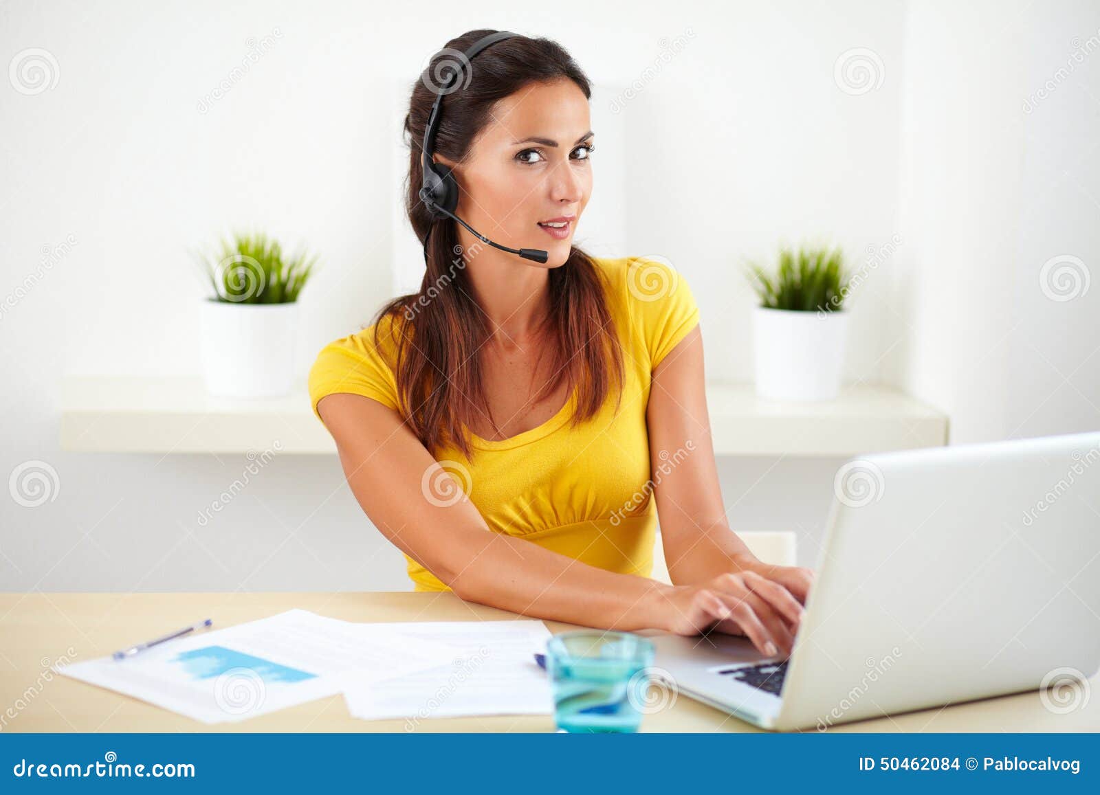 Pretty Receptionist Talking on the Phone Stock Photo - Image of people ...