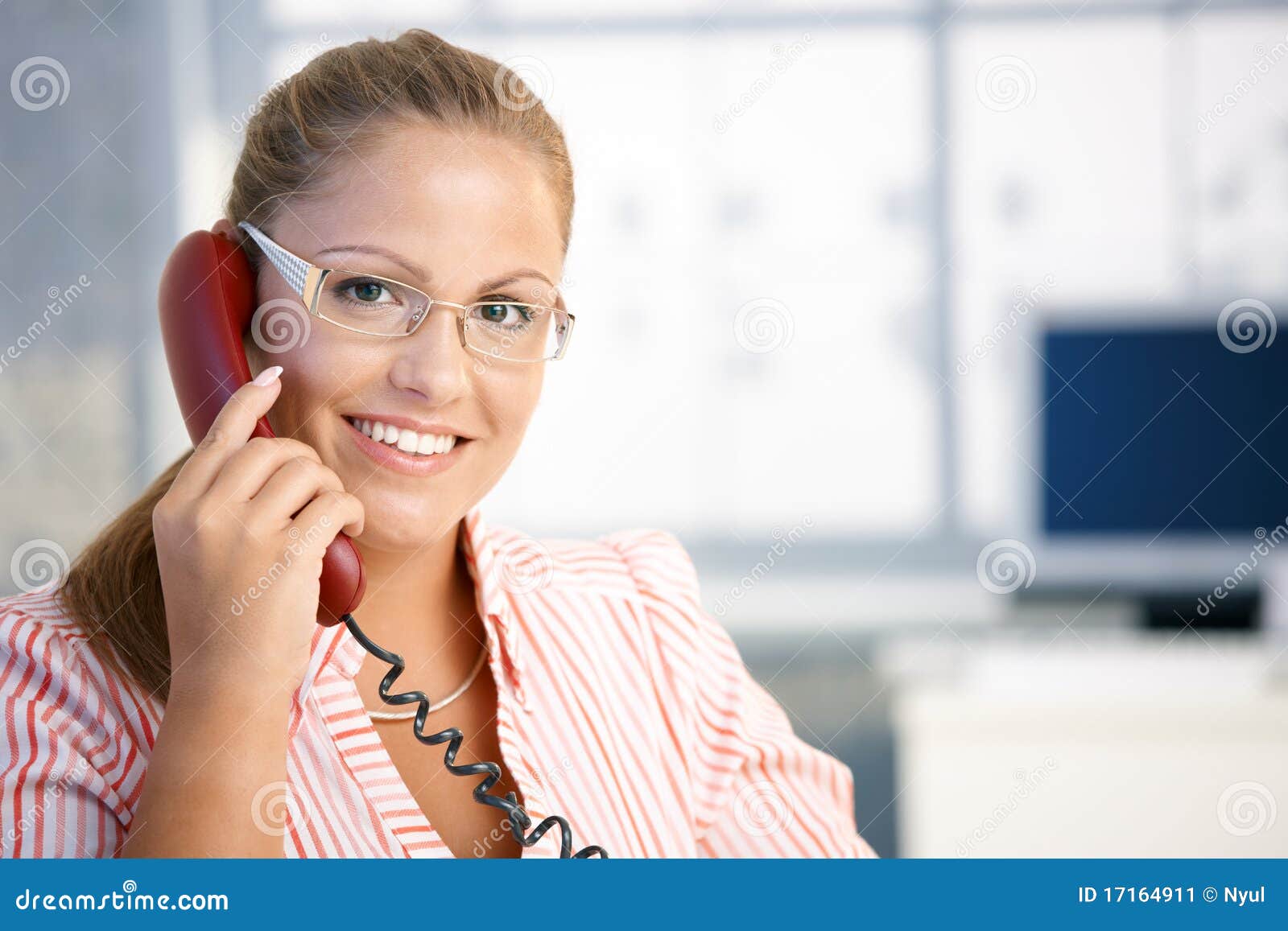 Pretty Receptionist Working Talking on Phone Stock Image - Image of ...