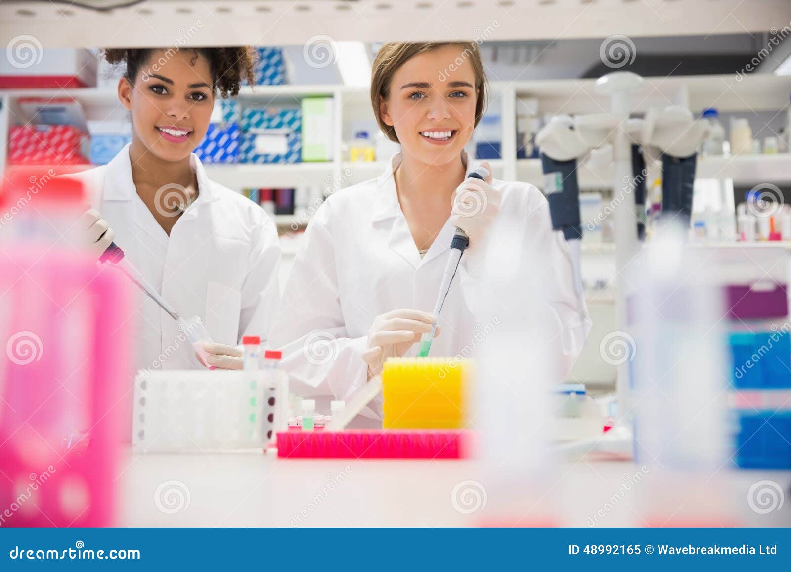Pretty Science Students Using Pipette Stock Image - Image of camera ...