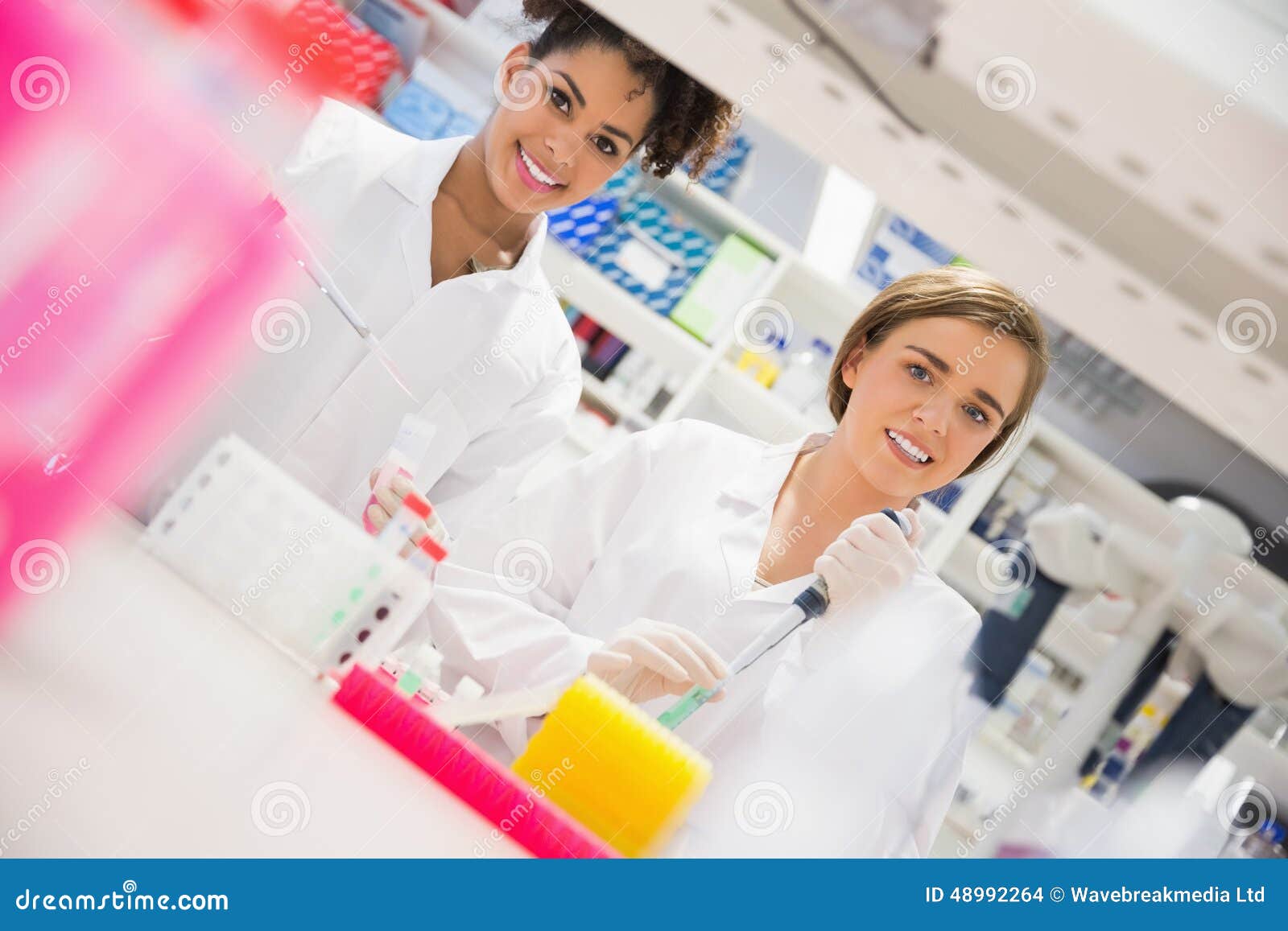 Pretty Science Students Using Pipette Stock Photo - Image of medicine ...