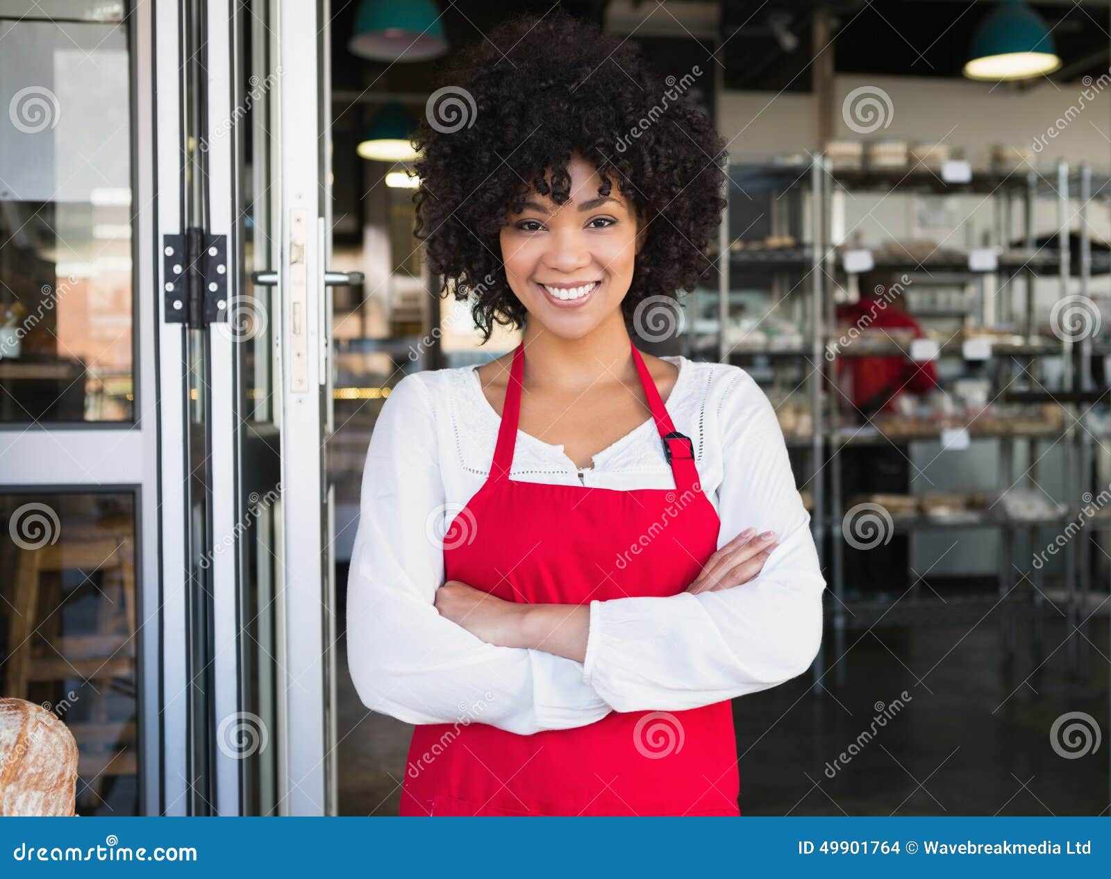 Pretty Server in Red Apron with Arms Crossed Stock Photo - Image of ...